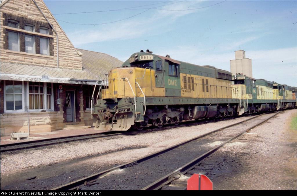 DME 6617 and DME 6602 in CNW paint EB at depot